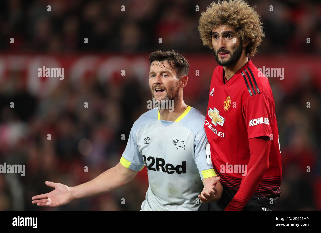 Derby County's David Nugent (left) and Manchester United's Marouane ...