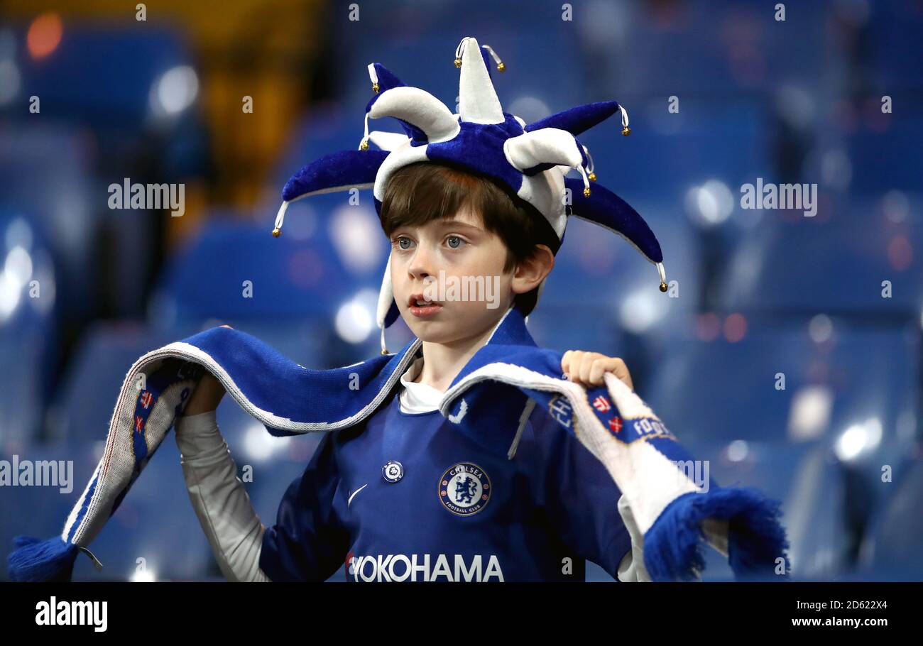 A young Chelsea fan shows his support in the stands prior to the match ...