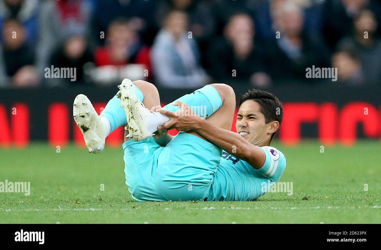 Newcastle United's Yoshinori Muto goes down injured Stock Photo - Alamy