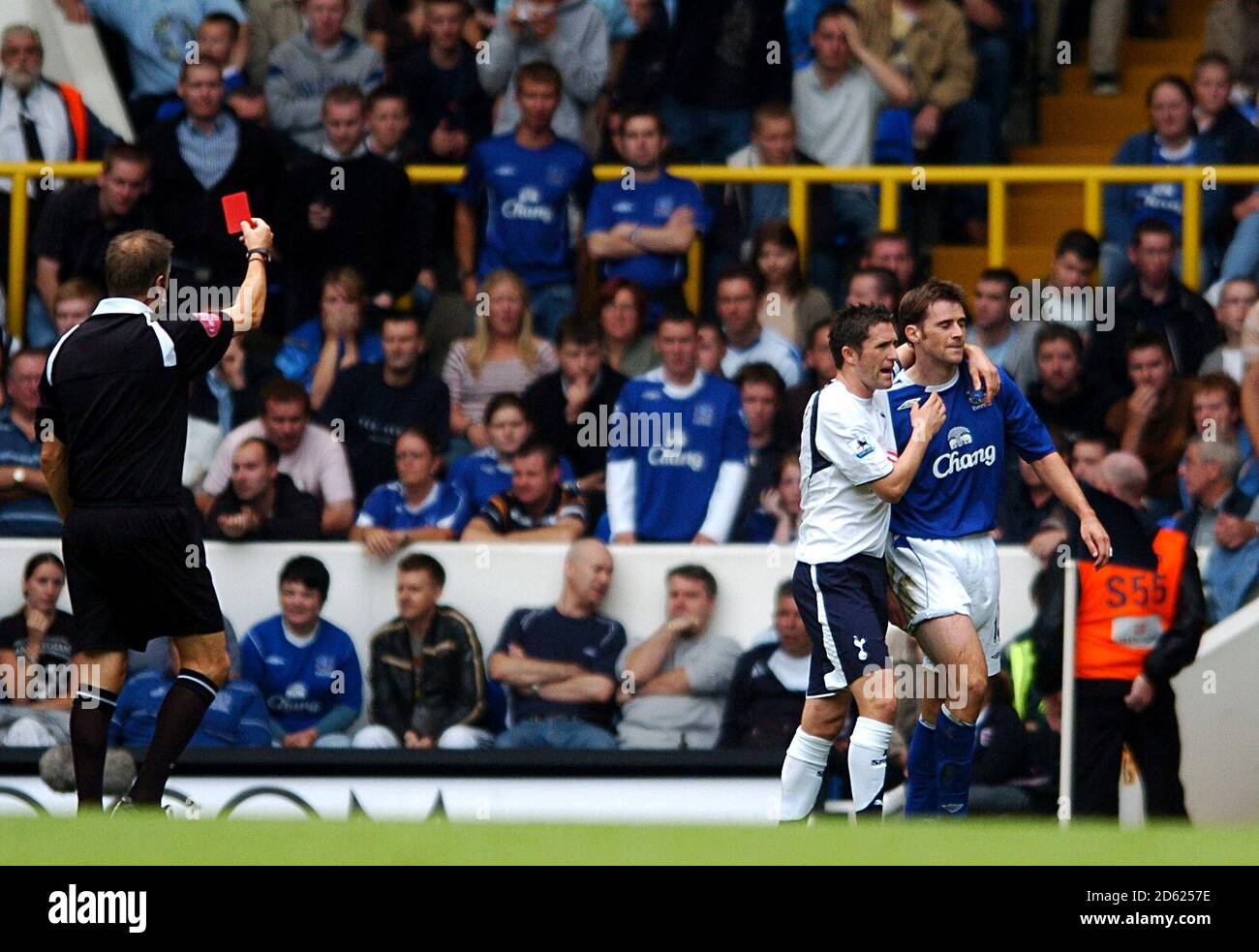 Everton's Kevin Kilbane is sent off and is consoled by Tottenham ...