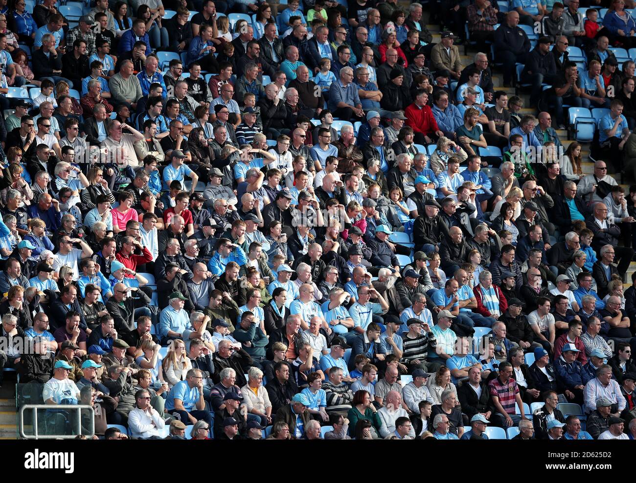 Coventry City fans in the stands Stock Photo - Alamy