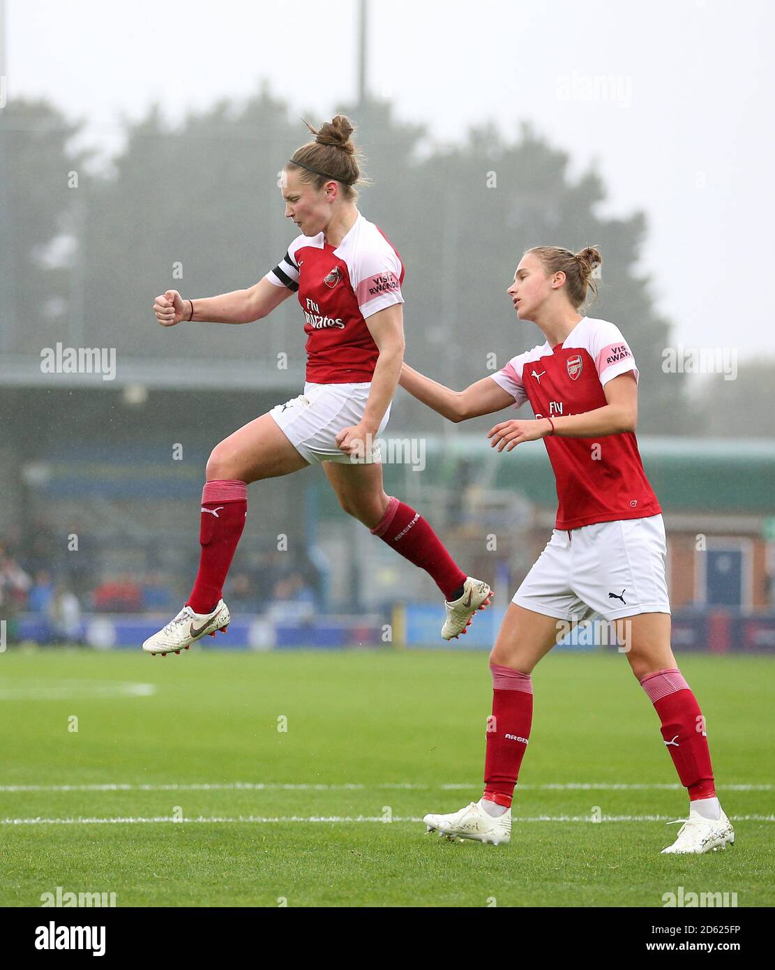 Arsenal Women's Kim Little (left) celebrates after scoring the opening ...