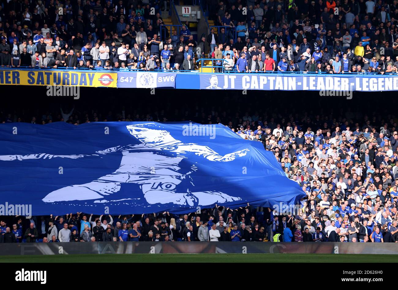 A general view of fans in the stands as they hold up banners for ...