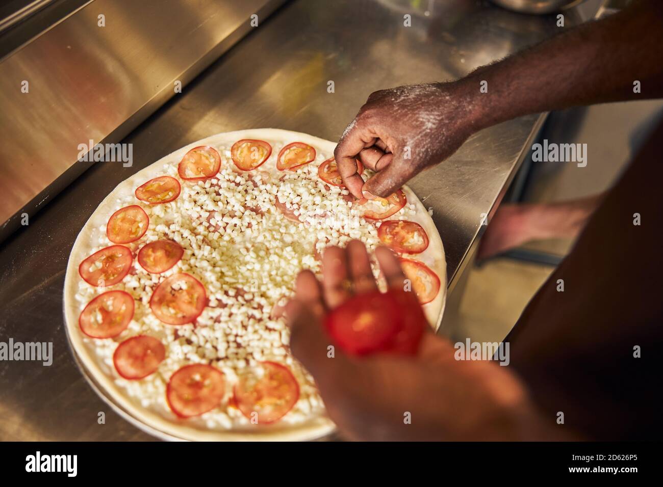 Male cooker making tasty pizza in restaurant Stock Photo - Alamy