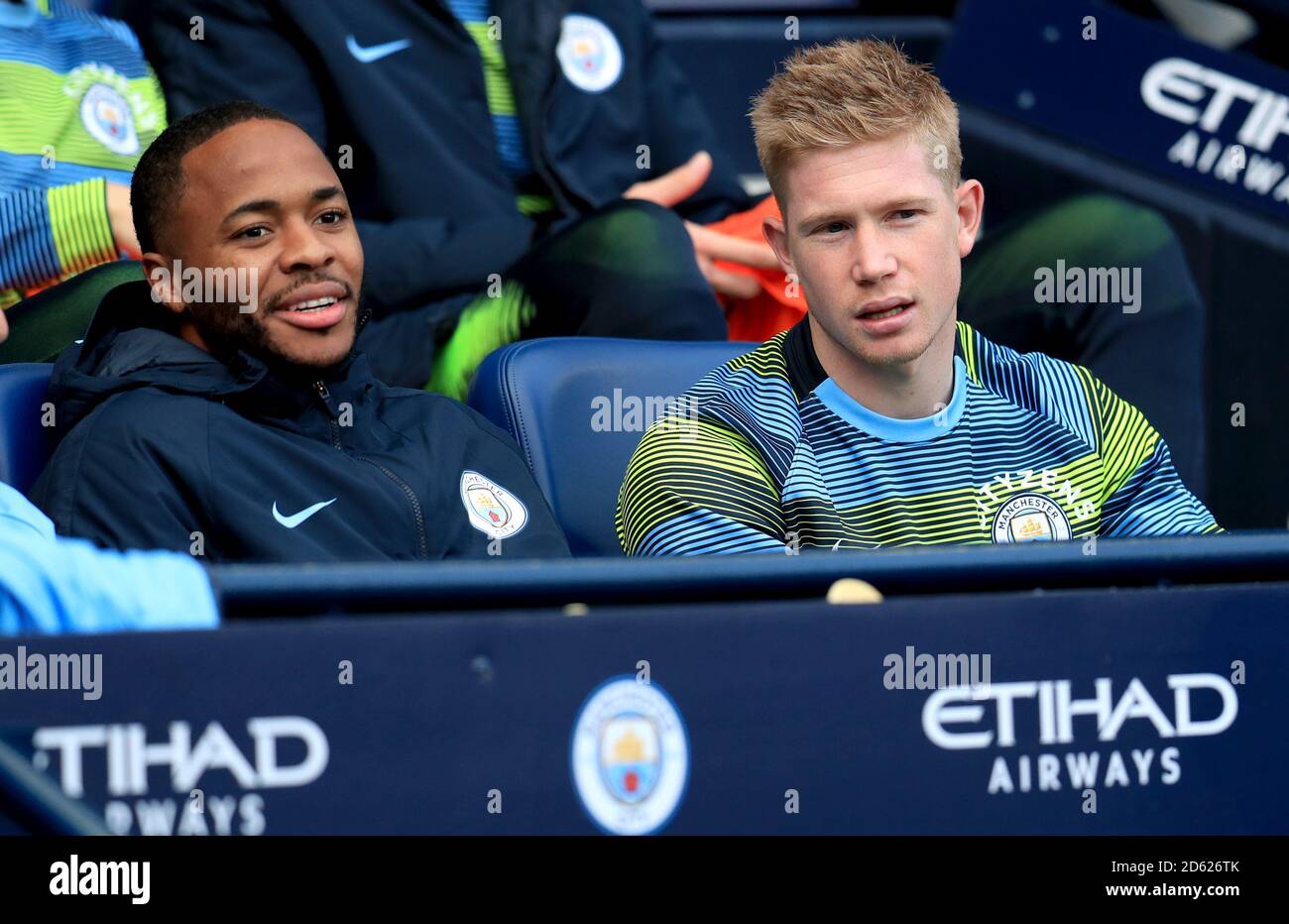 Manchester City's Kevin De Bruyne (right) and Raheem Sterling sit on ...