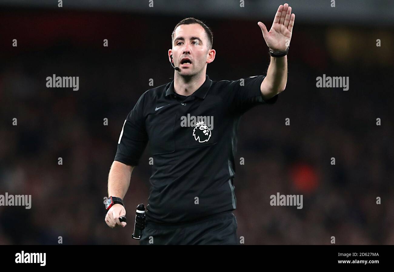 Referee Chris Kavanagh signals Stock Photo - Alamy