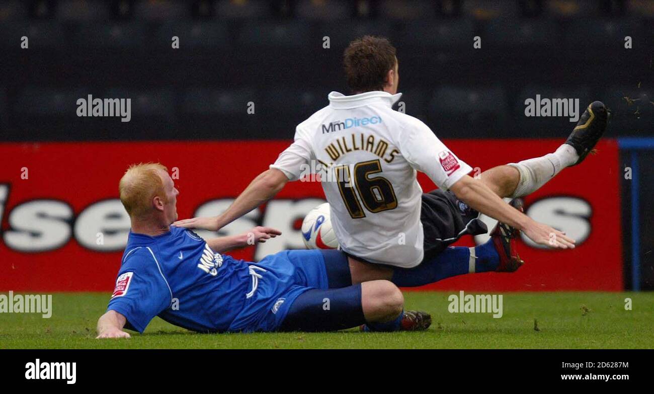 Rochdale's James Sharp brings down Hereford United's Andy William to ...