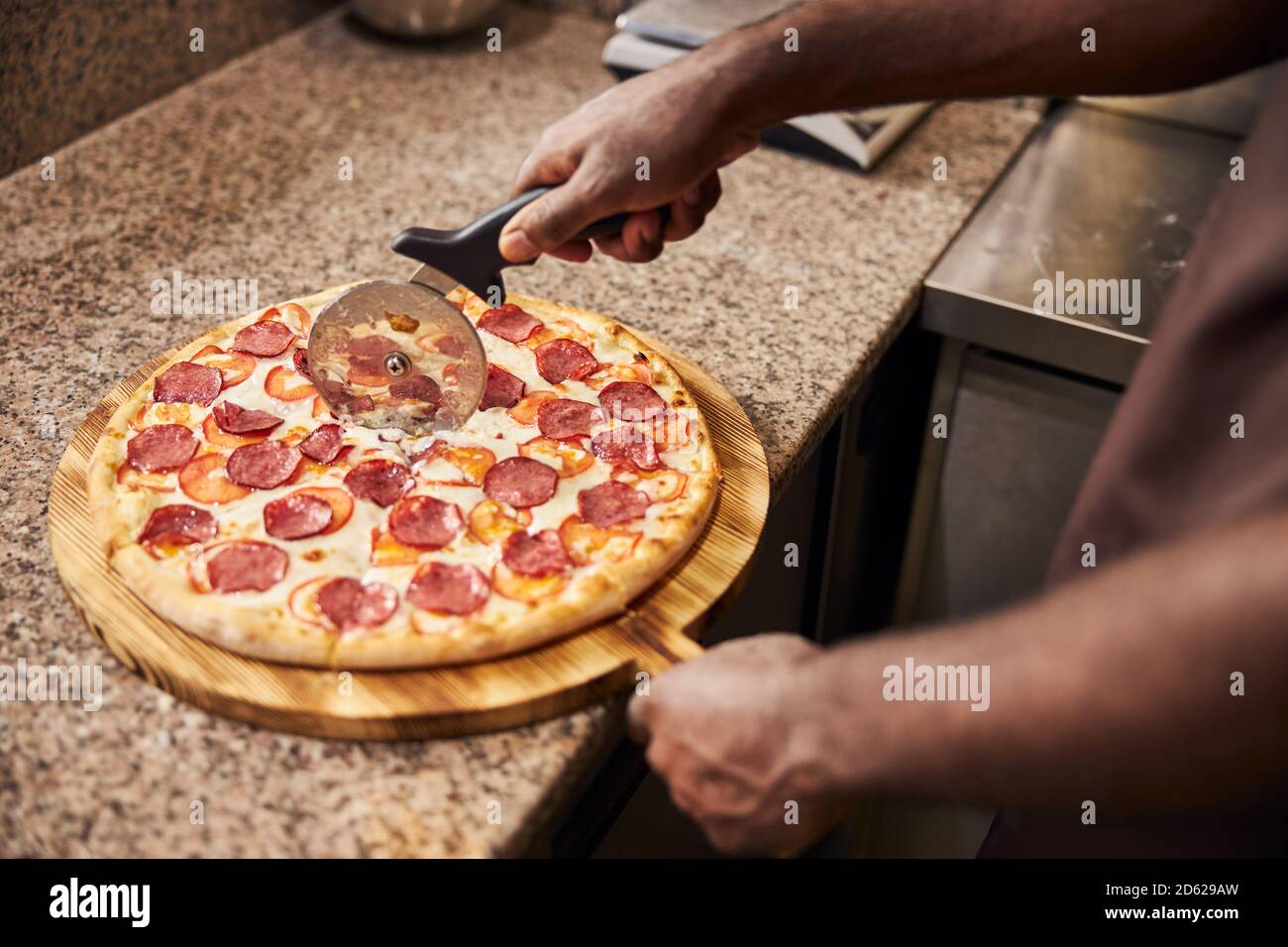 Pizza cutting wheel hi-res stock photography and images - Alamy