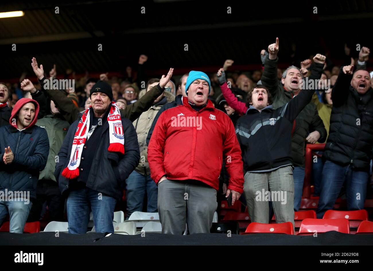 A general view of Stoke City fans in the stands as they cheer on their ...