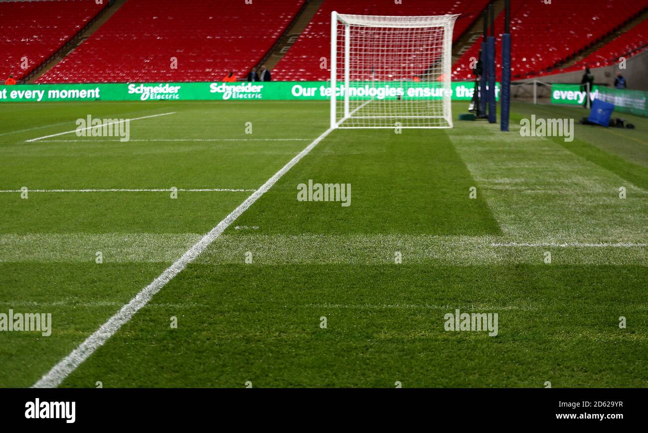 NFL markings still visible on the pitch before the Premier League match ...