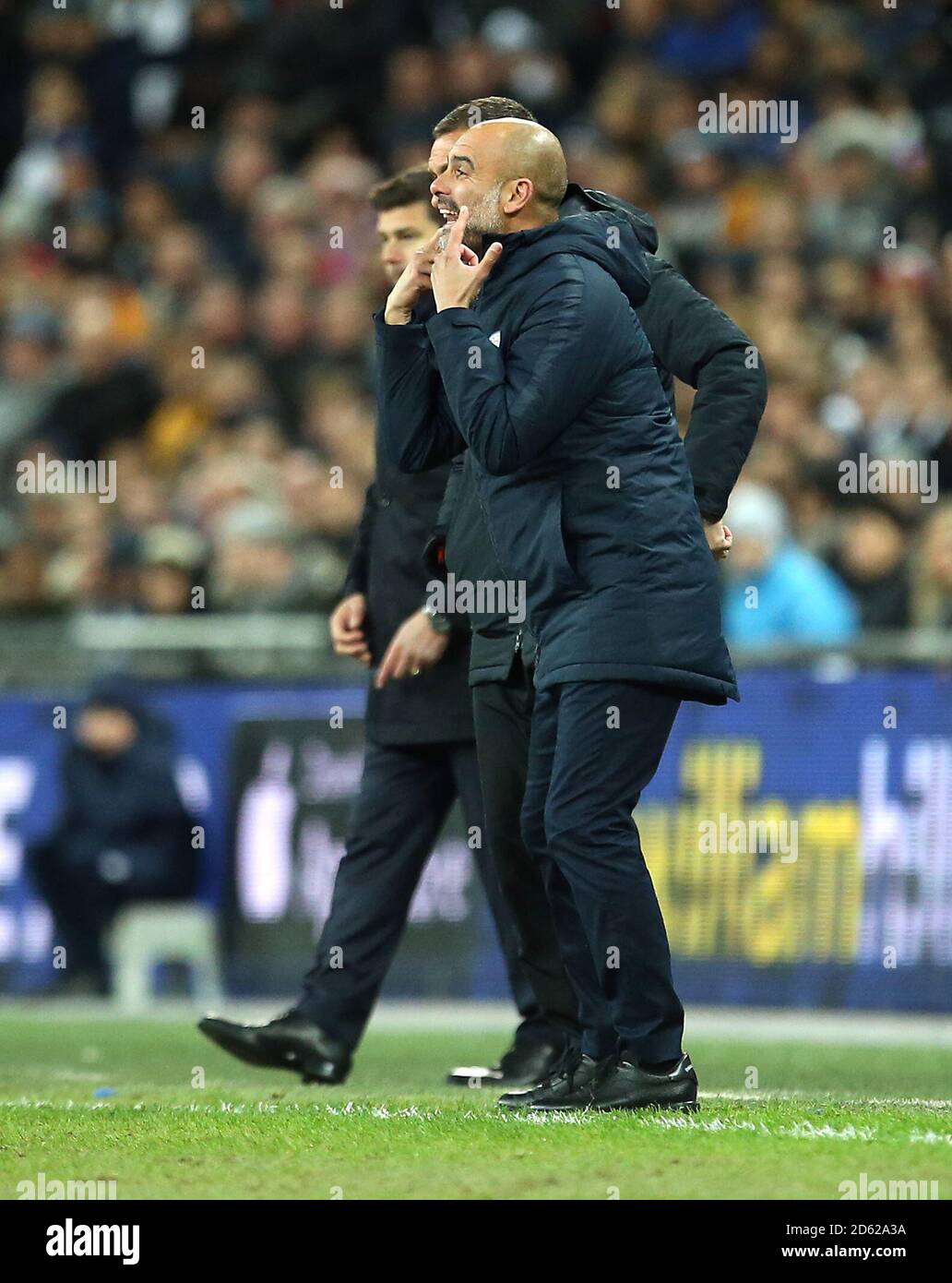 Manchester City manager Pep Guardiola gestures on the touchline Stock ...