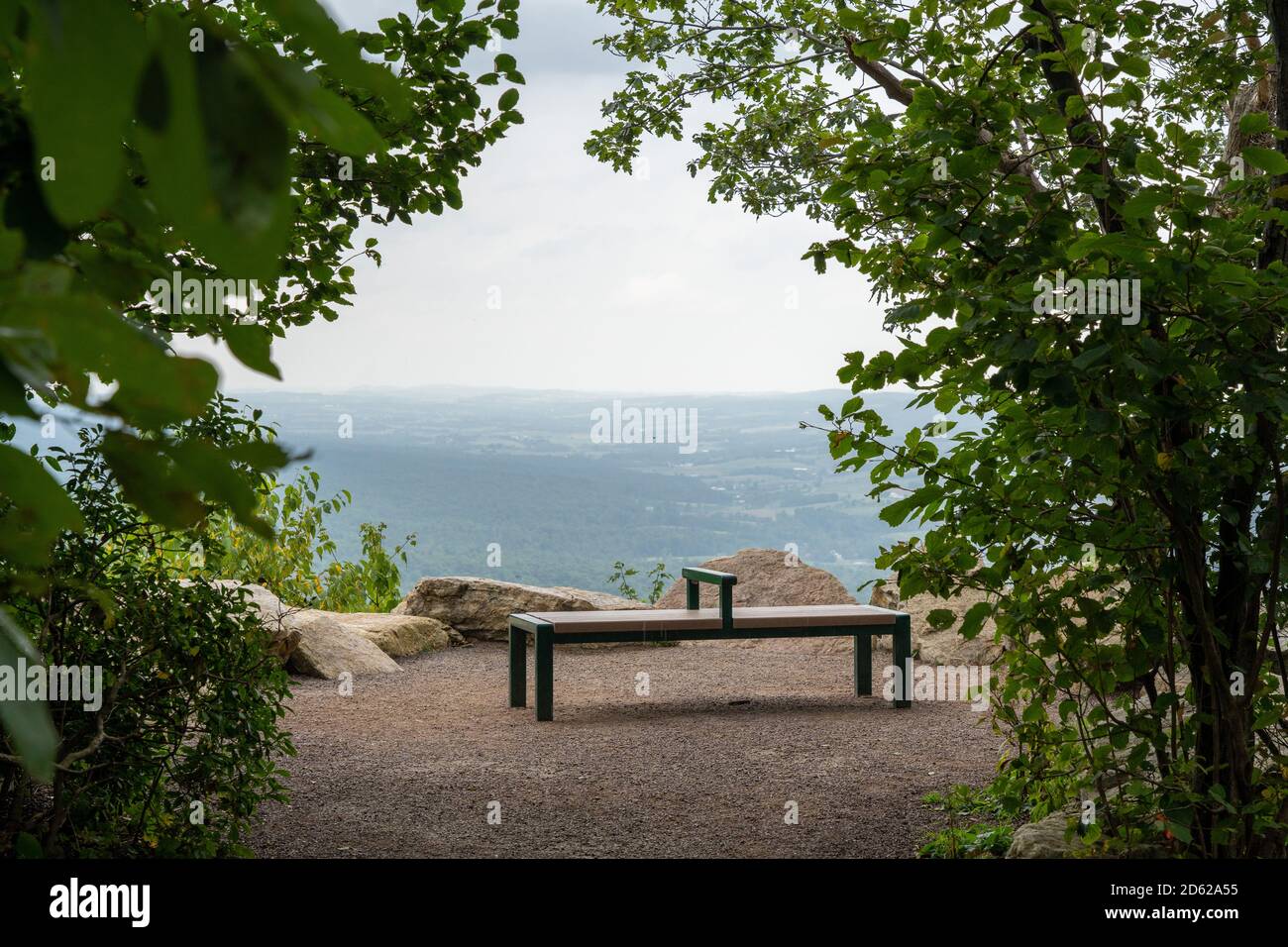 A bench at the rocky outcrop at the Hawk Mountain sanctuary overlook in ...