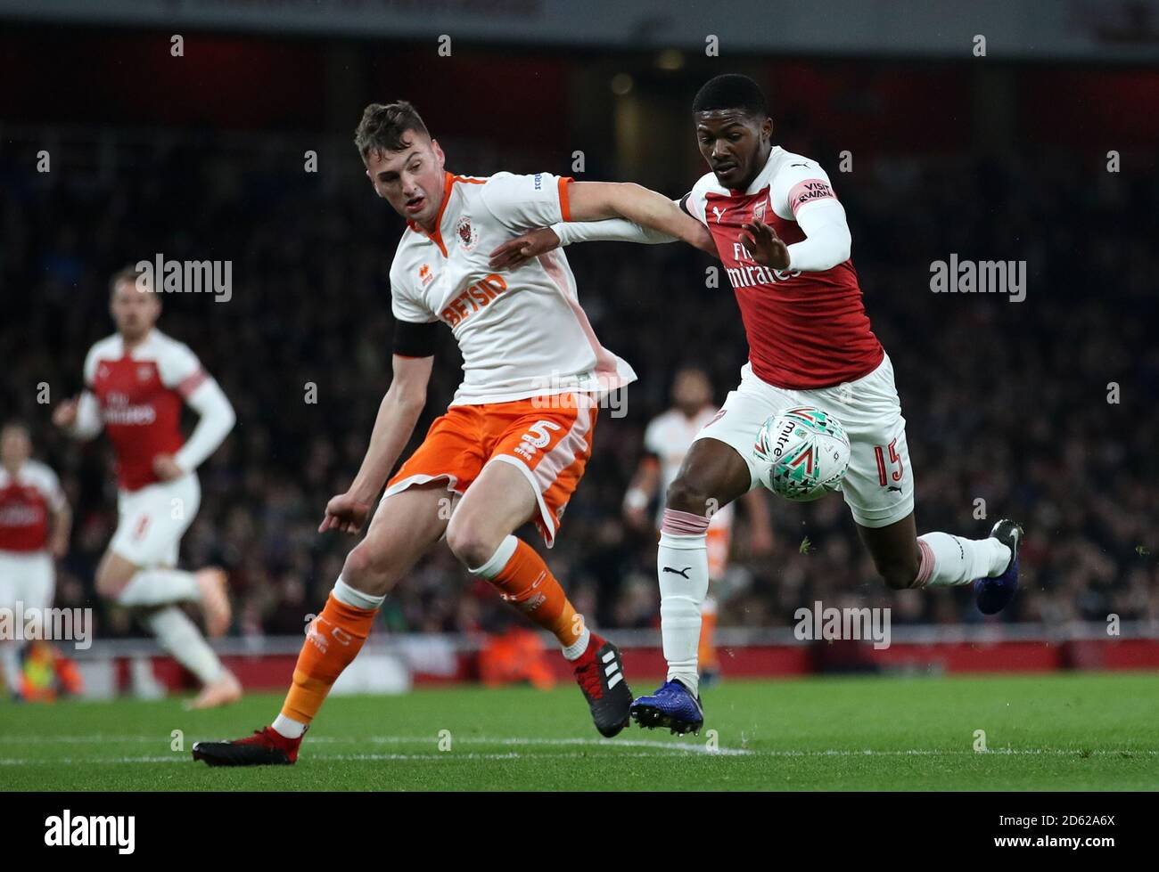 Arsenal's Ainsley Maitland-Niles (right) and Blackpool's Paudie O ...