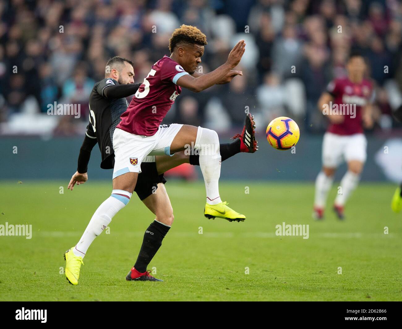 Grady Diangana of West Ham United tries to tackle Burnley's Steven ...