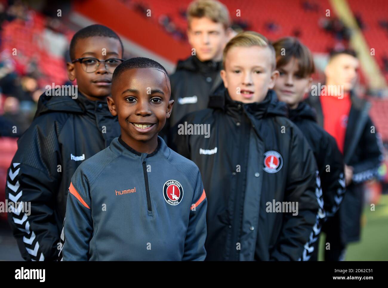 Ball boys beside the pitch before the game Stock Photo - Alamy