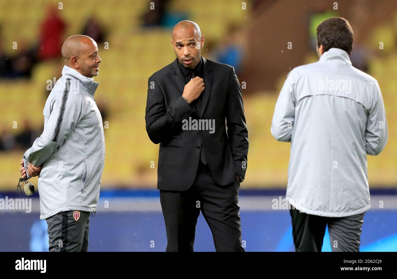AS Monaco's Manager Thierry Henry (centre) inspects the pitch before ...