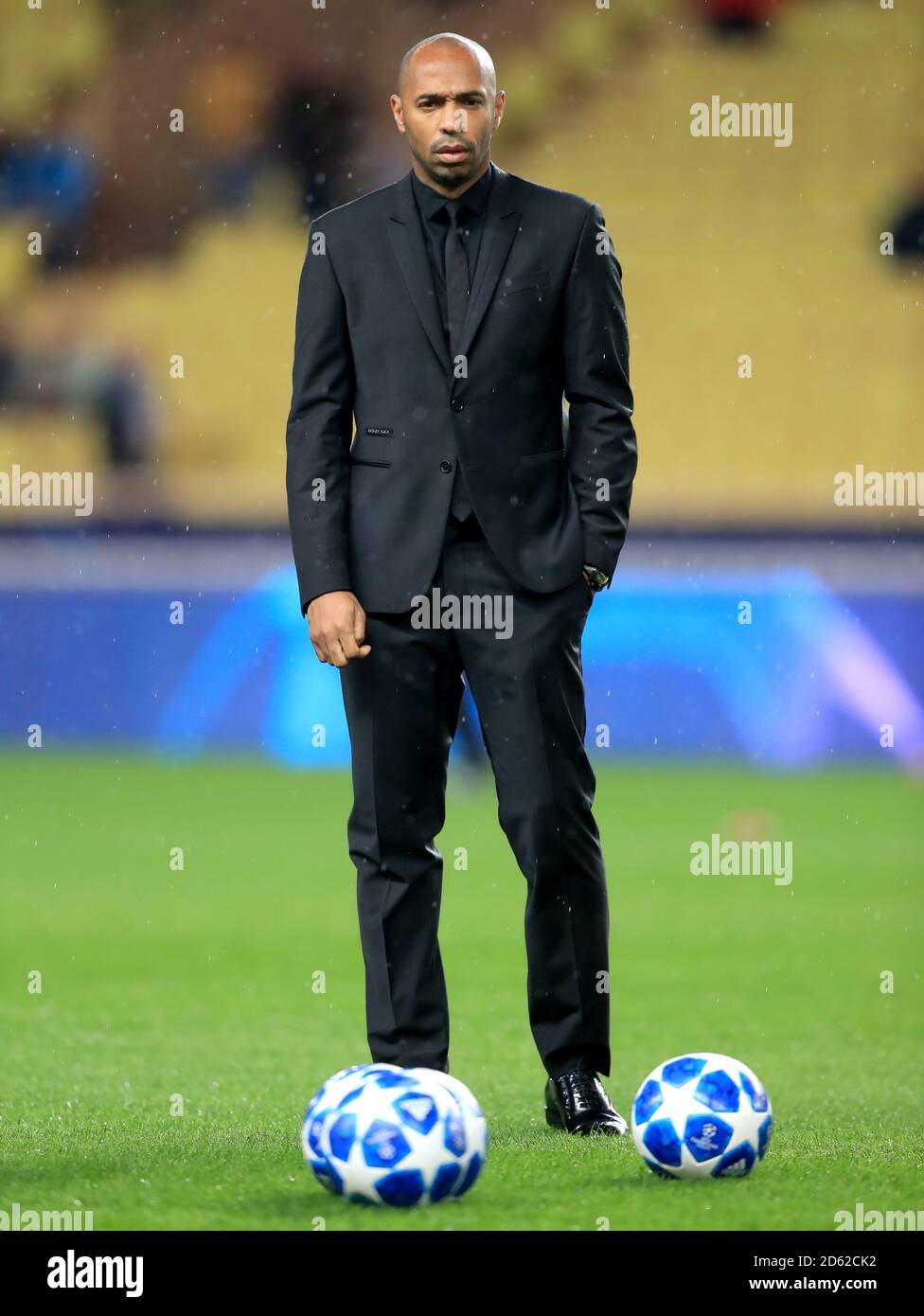 AS Monaco's Manager Thierry Henry inspects the pitch before the match ...