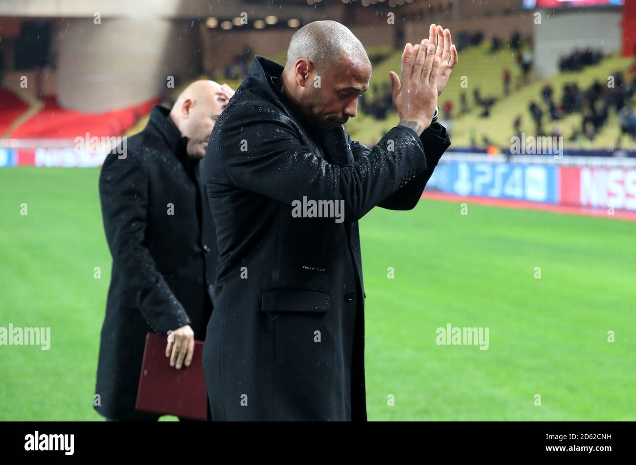 AS Monaco's Manager Thierry Henry applauds the fans at the end of the ...