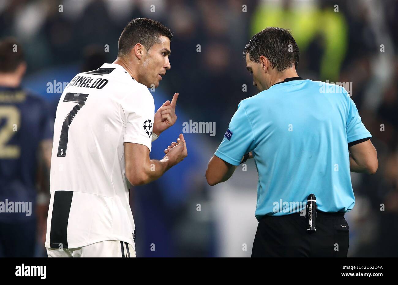Juventus' Cristiano Ronaldo (left) argues with referee Ovidiu Alin ...
