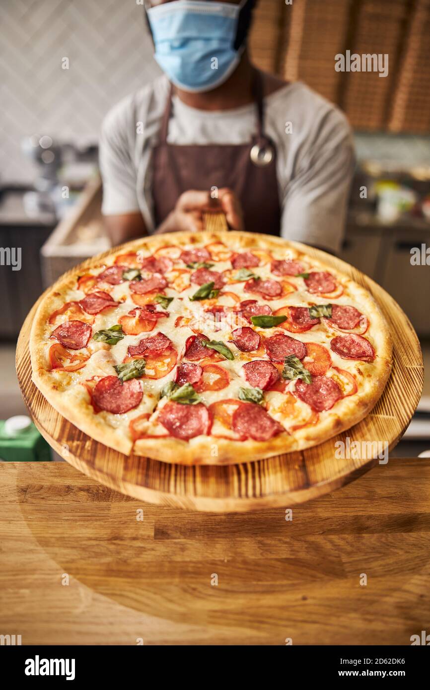 Male pizzeria worker hi-res stock photography and images - Alamy