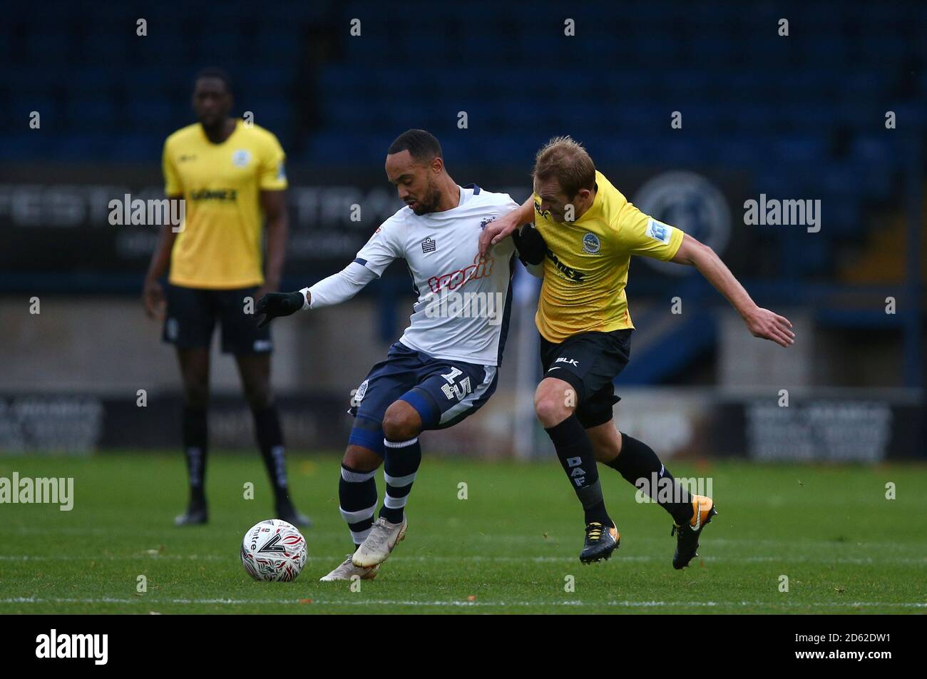 Bury's Byron Moore (left) and Dover Athletic's Stuart Lewis battle for ...