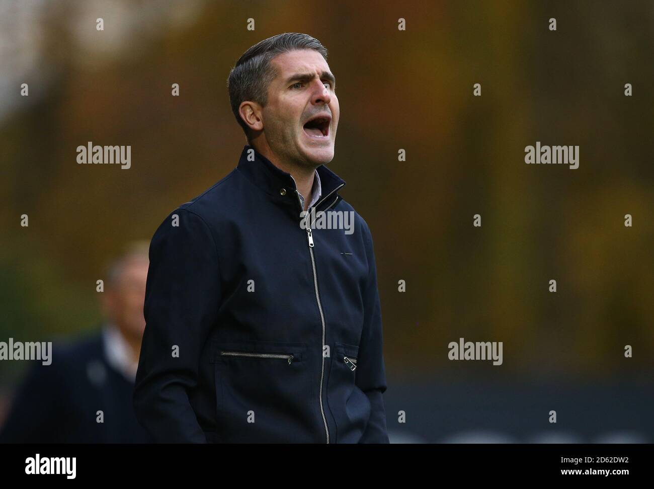Bury manager Ryan Lowe instructs his players during the game Stock ...
