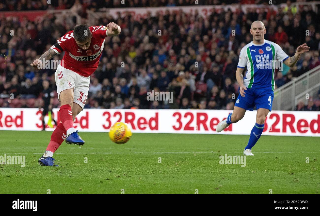Middlesbrough's Jordan Hugill (left) scores his side's second goal of ...