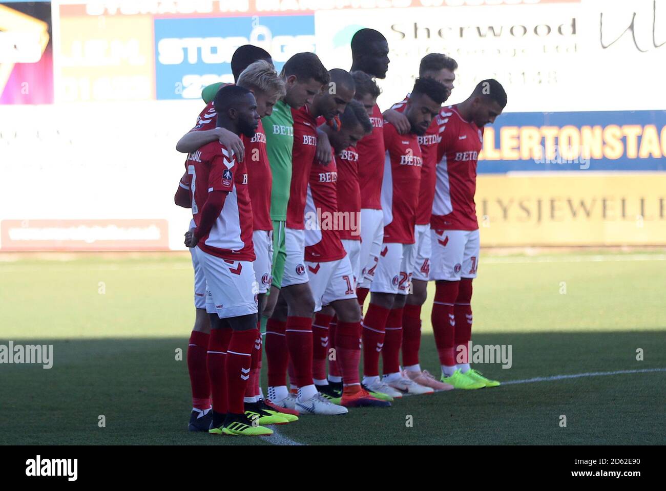 Charlton Athletic stand for a minutes silence Stock Photo - Alamy