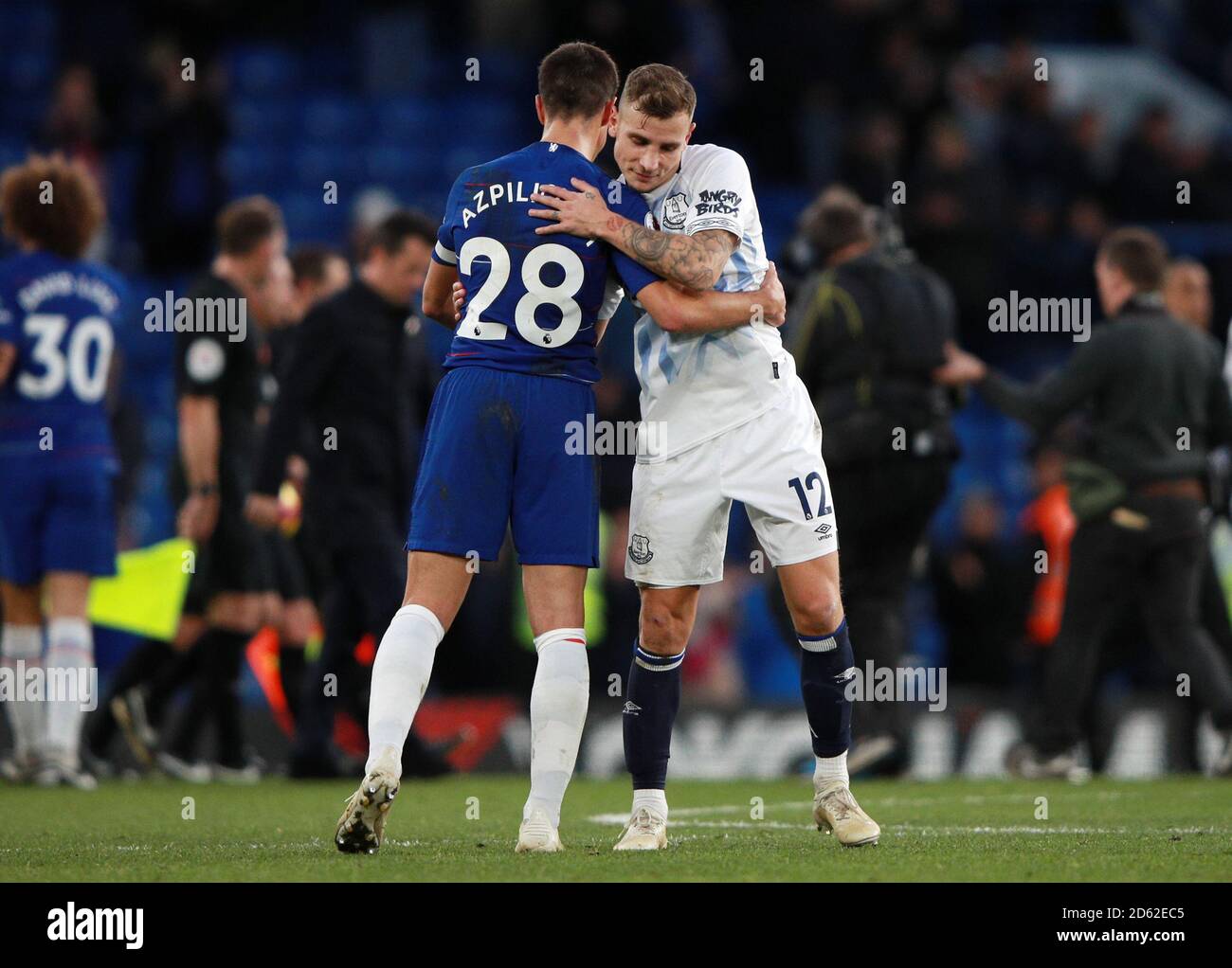Chelsea's Cesar Azpilicueta (left) and Everton's Lucas Digne embrace after the final whistle ...