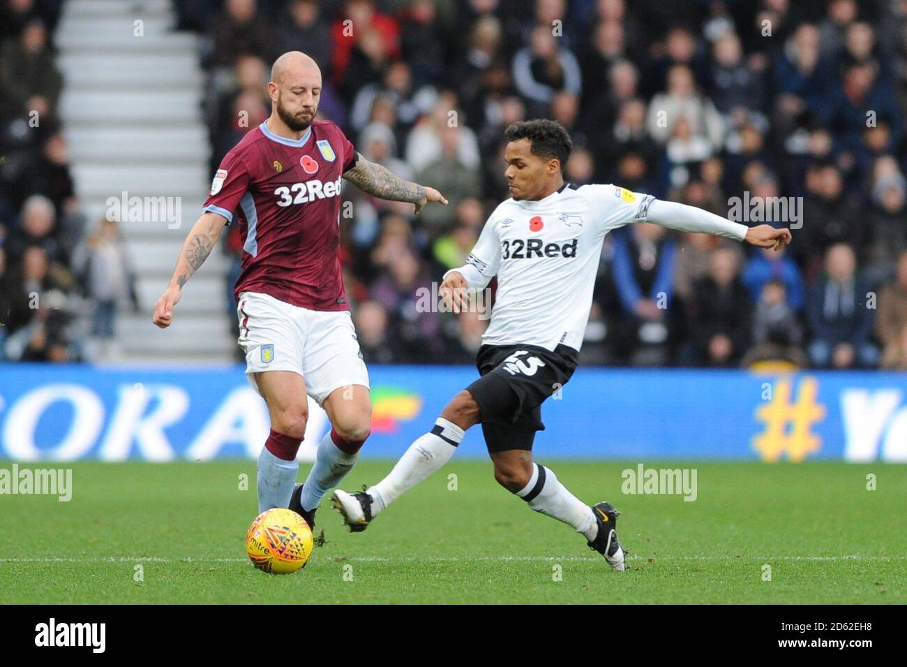 Aston Villa's Alan Hutton (left) and Derby County's Duane Holmes battle ...
