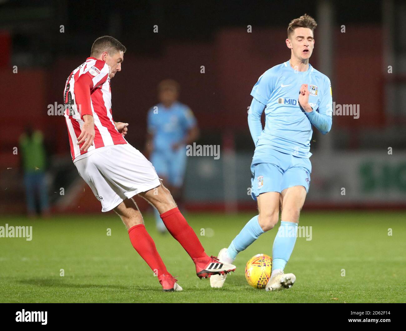 Coventry City's Tom Bayliss (right) and Cheltenham Town's Ben Tozer ...