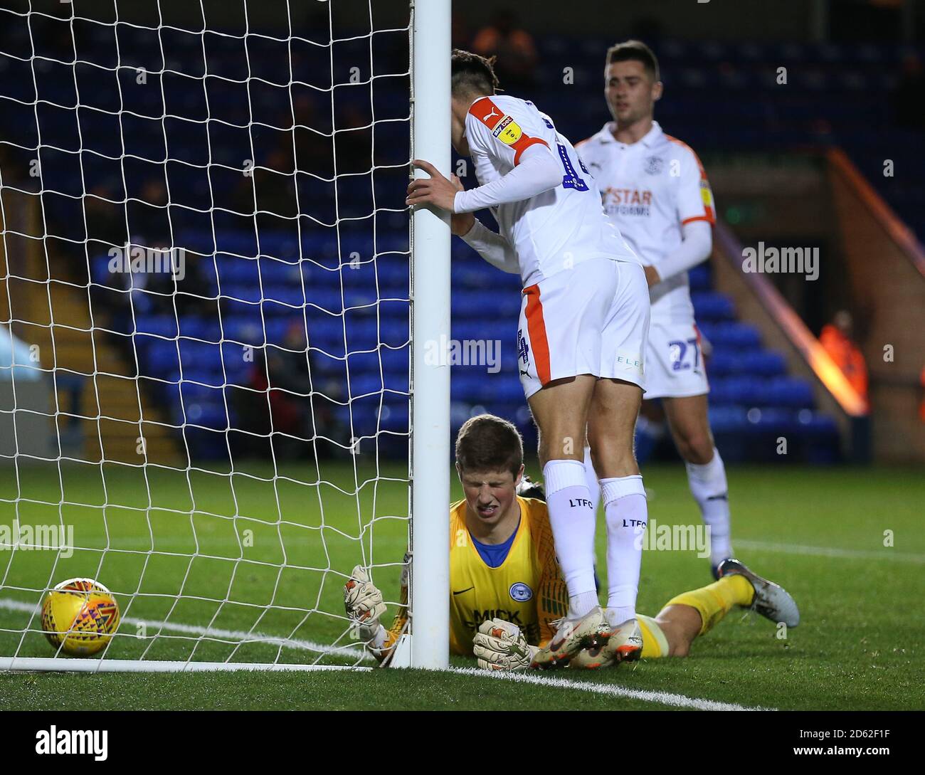 Football going into net hi-res stock photography and images - Alamy