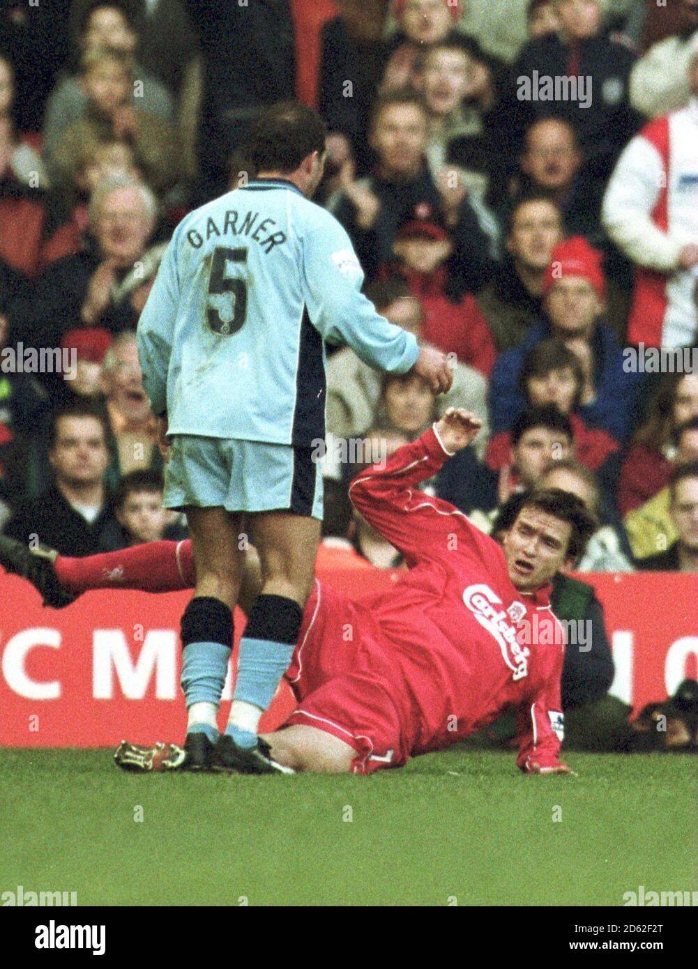 Liverpool's Vladimir Smicer (r) is shoved to the ground by Rotherham ...