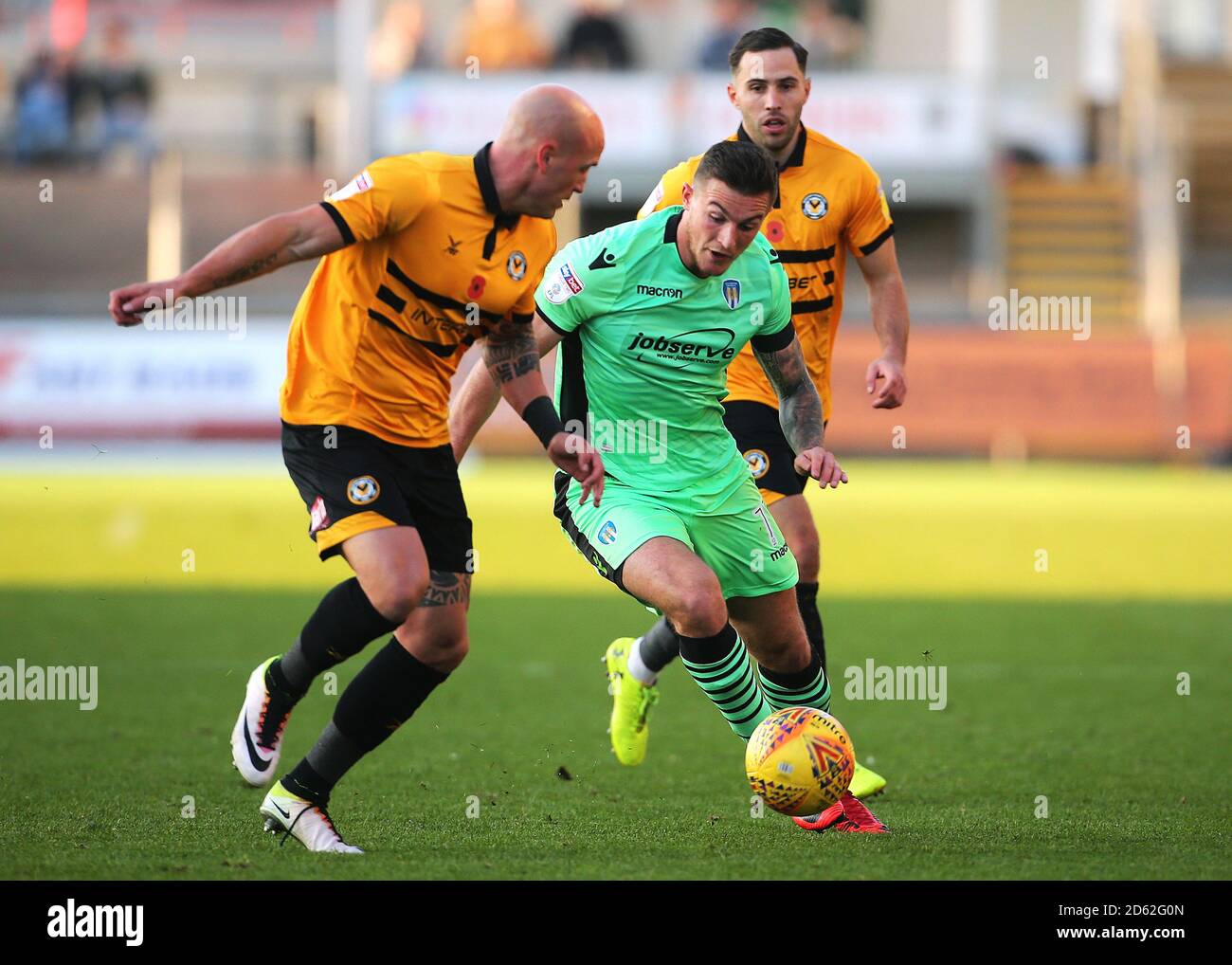 Colchester United's Ben Dickenson brings the ball forward, as Newport ...