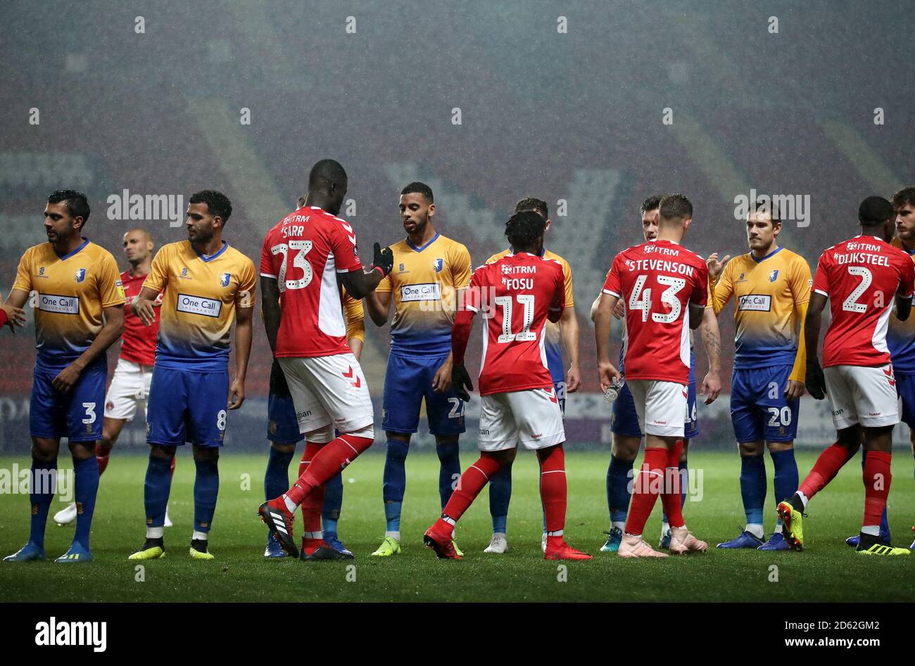 Charlton Athletic's team and Mansfield Town's team shake hands before ...