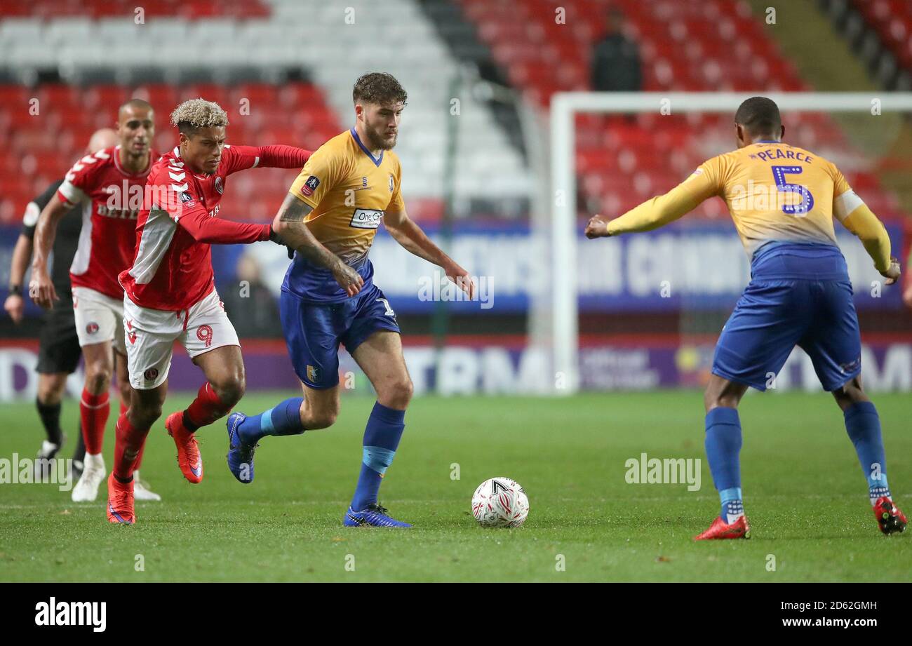 Charlton Athletic's Lyle Taylor (left) and Mansfield Town's Ryan ...