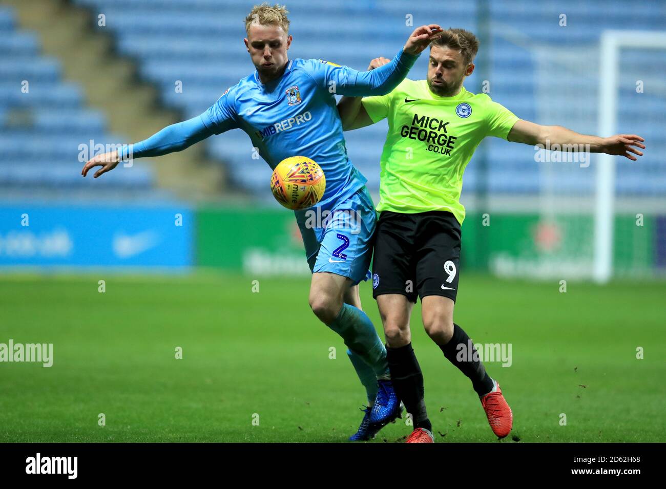 Coventry City's Jack Grimmer (left) and Peterborough United's Matt ...