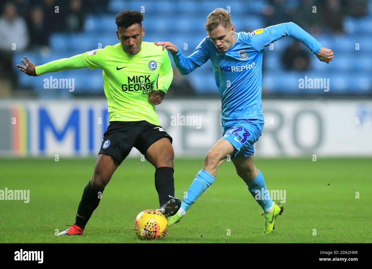 Coventry City's Luke Thomas (right) and Peterborough United's Tyler ...