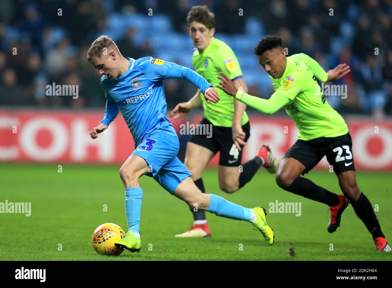 Coventry City's Luke Thomas (left) and Peterborough United's Tyler ...