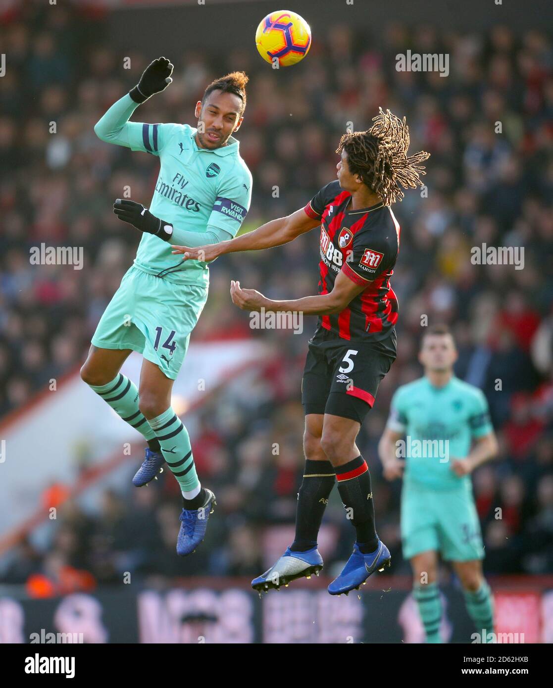 Arsenal's Pierre-Emerick Aubameyang (left) and Bournemouth's Nathan Ake ...