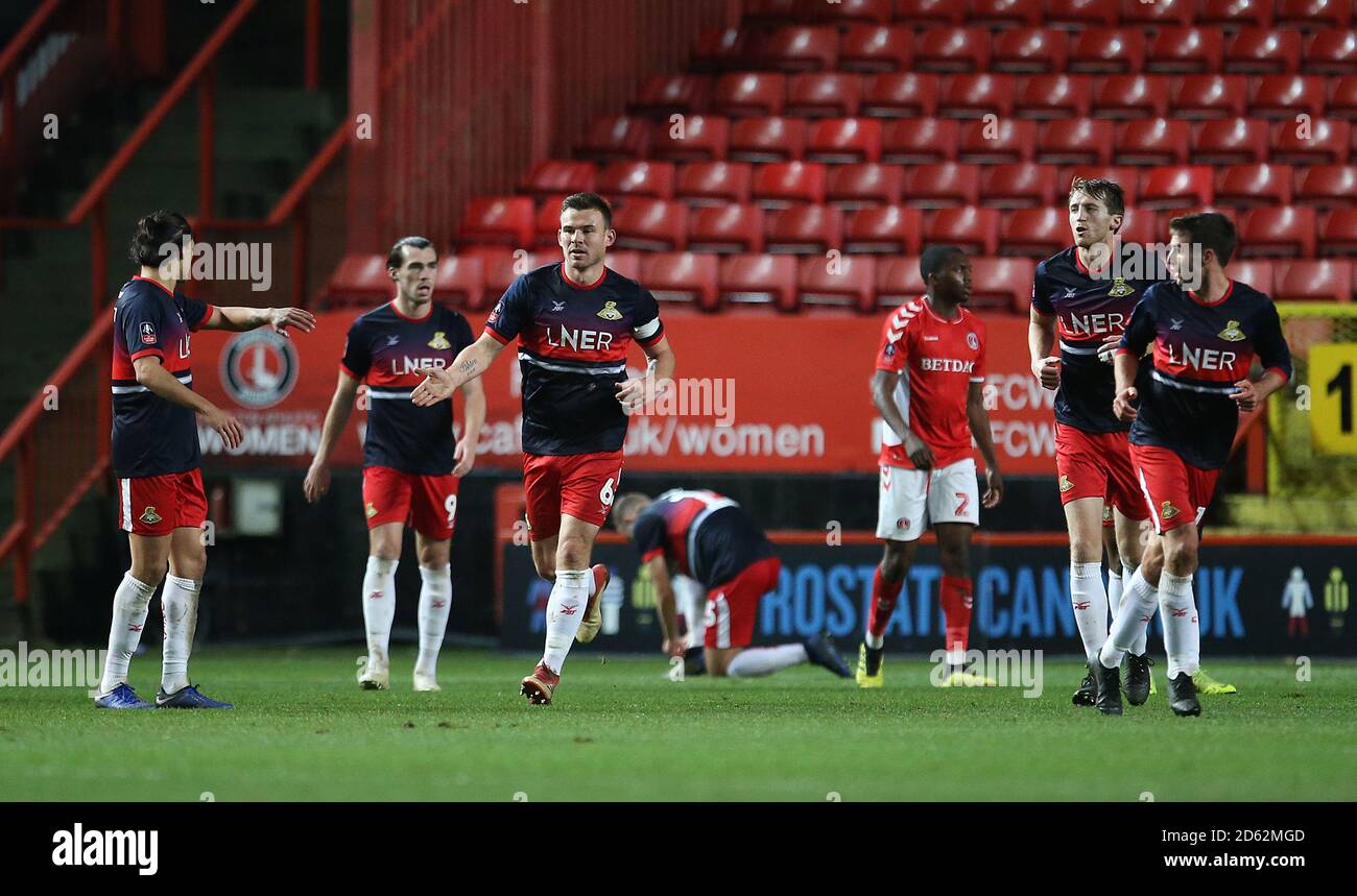 Doncaster Rovers Andy Butler (centre) celebrates scoring his side's ...
