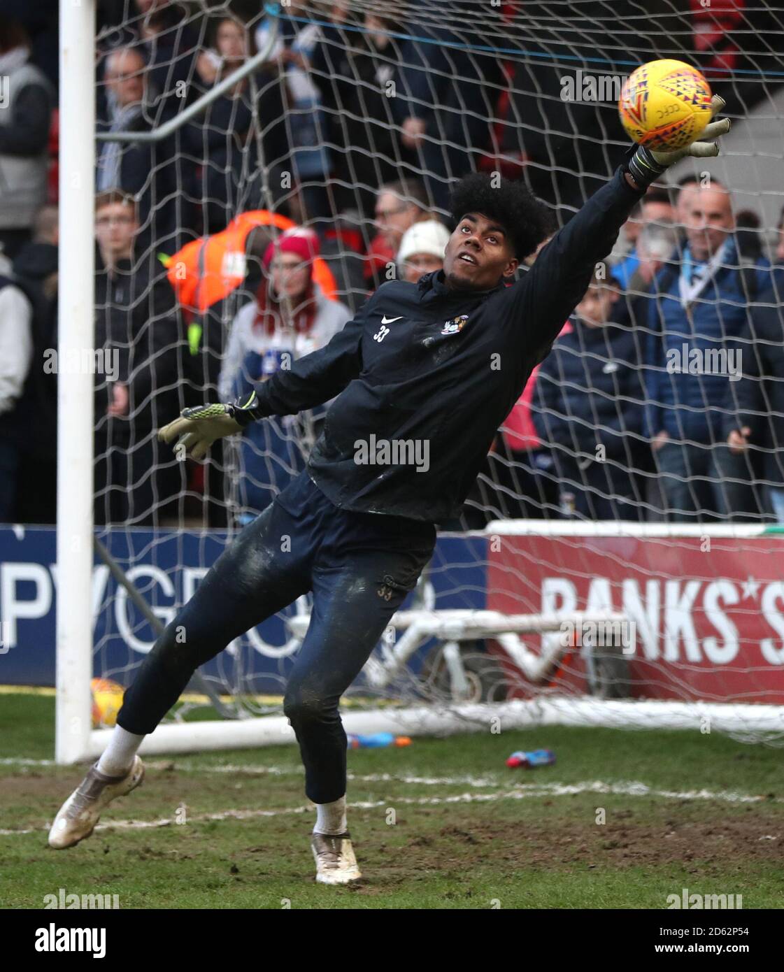 Coventry City goalkeeper Corey Addai warms Stock Photo - Alamy
