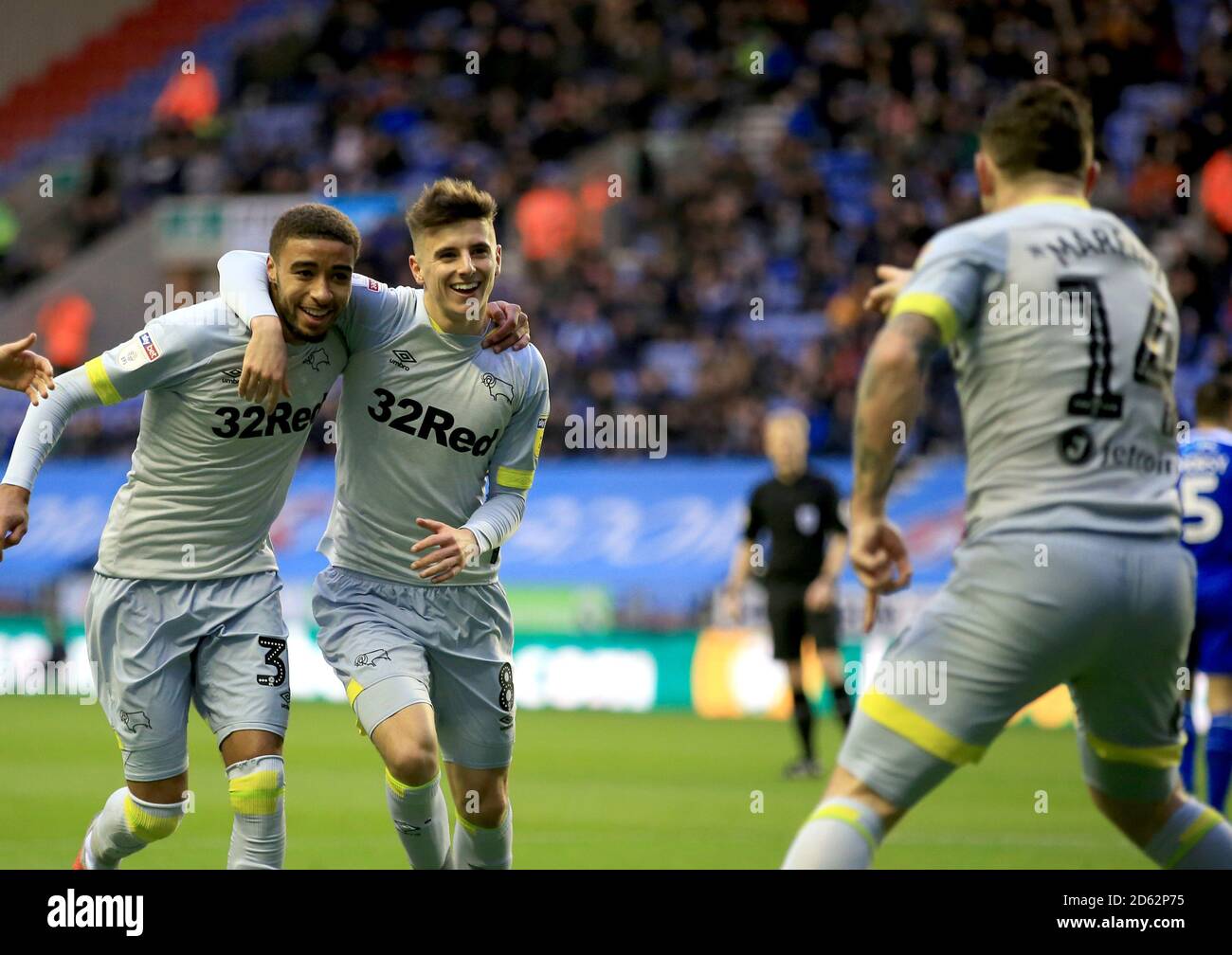Derby County's Jack Marriott (right) celebrates with teammates Mason ...