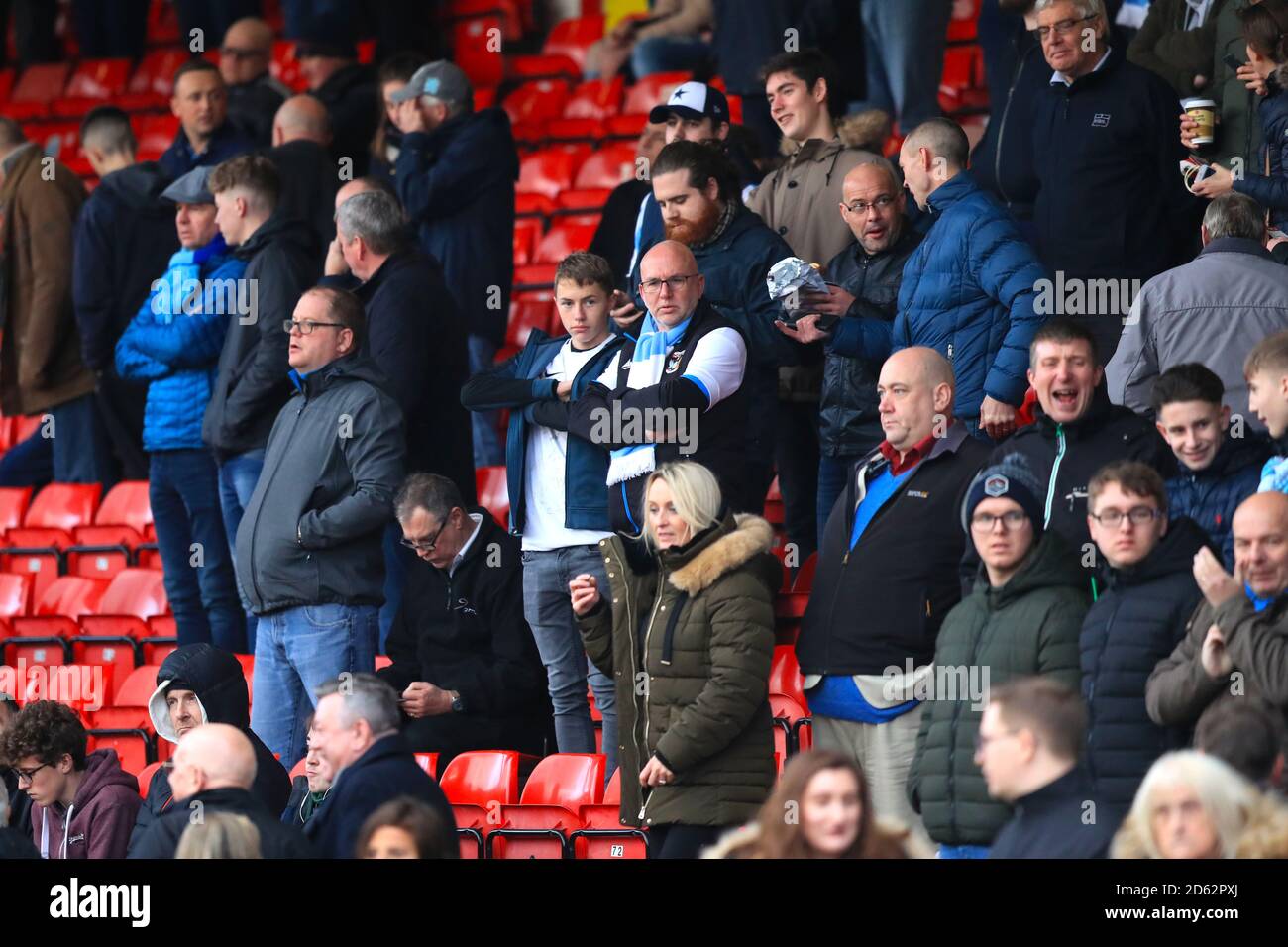 Coventry City fans in the stands Stock Photo - Alamy
