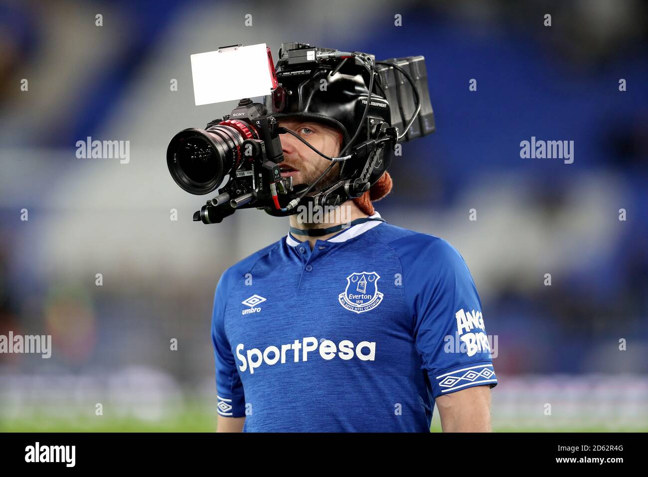 A person wears a camera set-up around their head on the pitch before ...