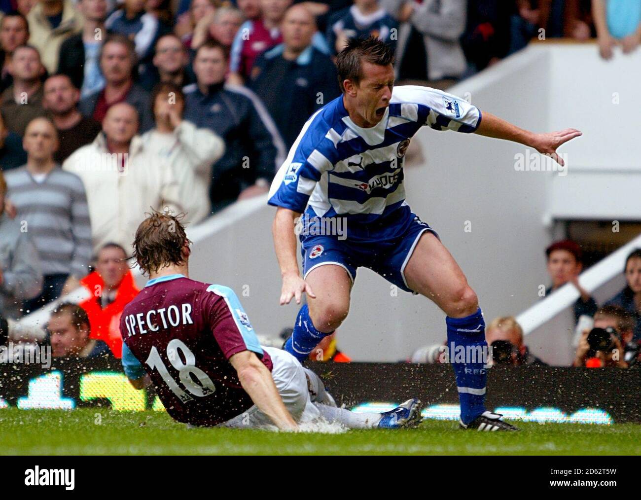 (L-R) West Ham United's Jonathan Spector challenges Reading Nicky ...