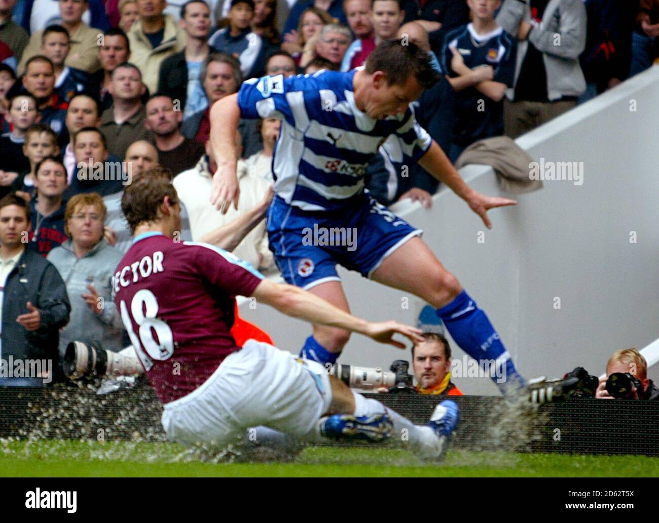 (L-R) West Ham United's Jonathan Spector challenges Reading Nicky ...