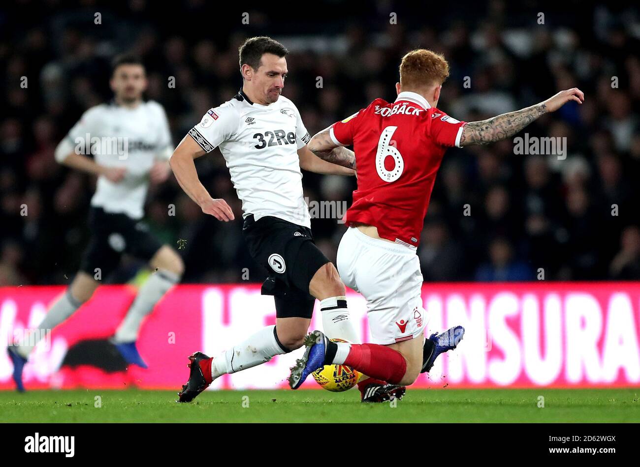 Derby County's Craig Bryson (left) and Nottingham Forest's Jack Colback ...