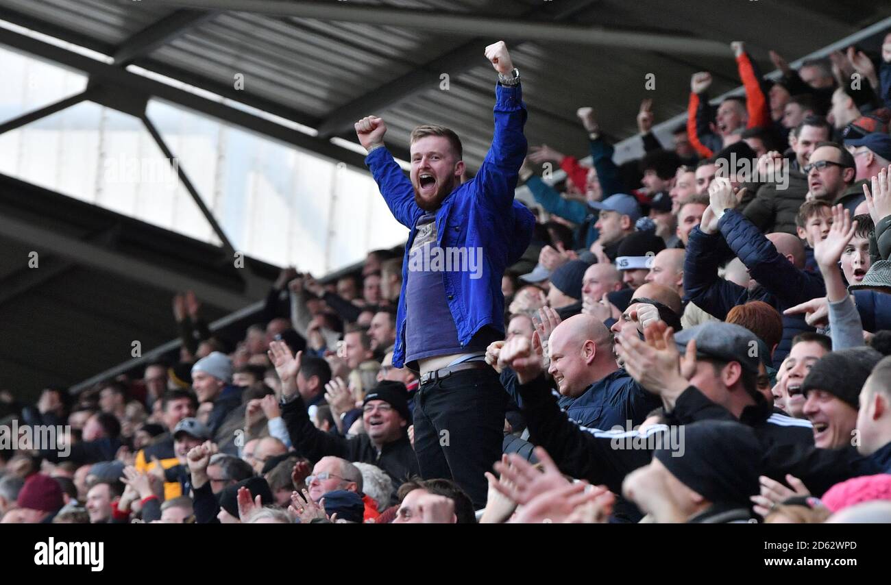 Fans in the stand react Stock Photo - Alamy