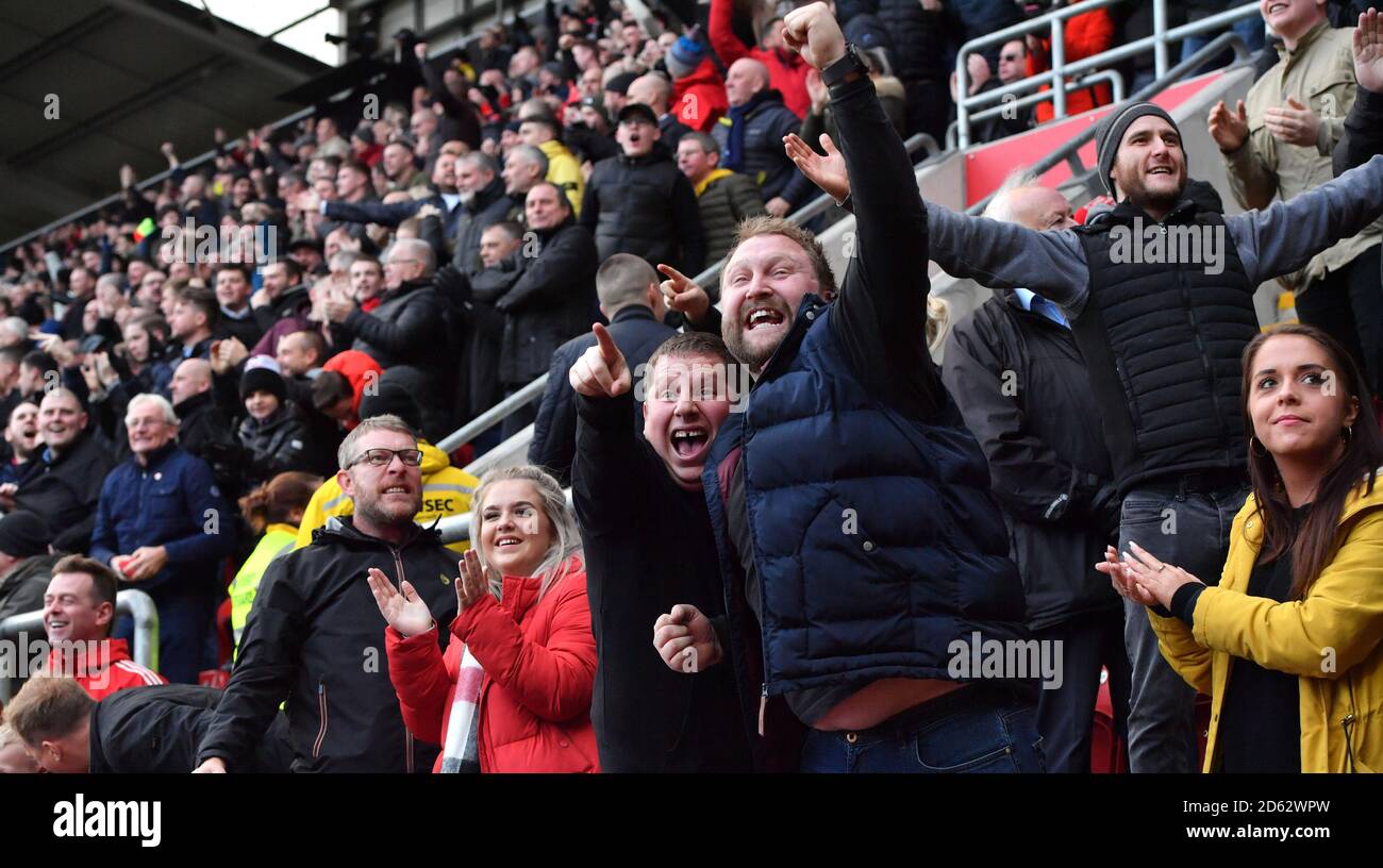 Fans in the stand react Stock Photo - Alamy